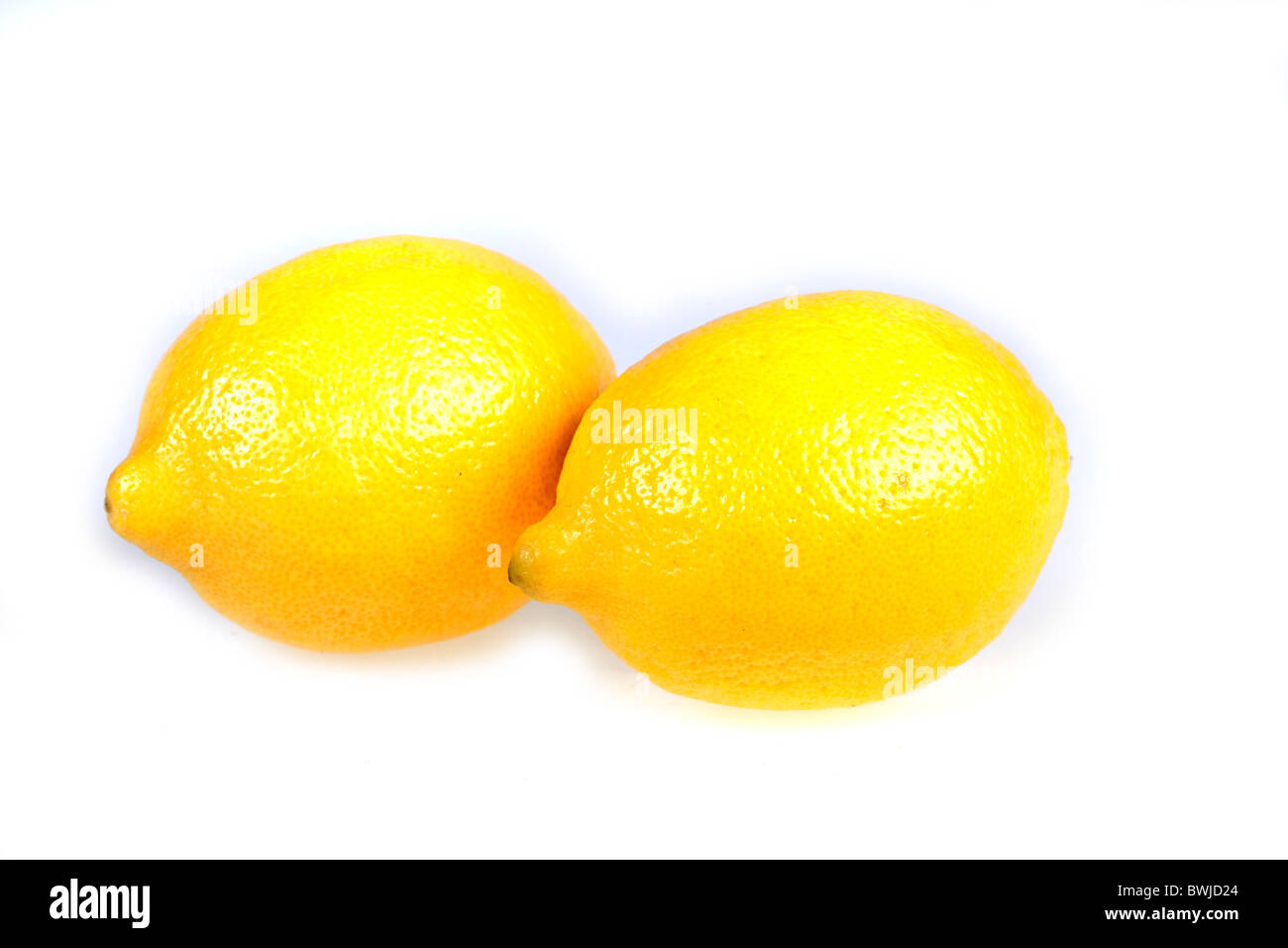 two lemons isolated over white Stock Photo - Alamy
