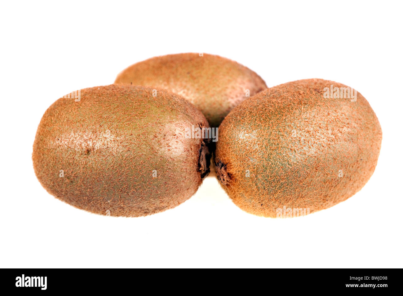 Three ripe kiwi. Isolated over white Stock Photo - Alamy
