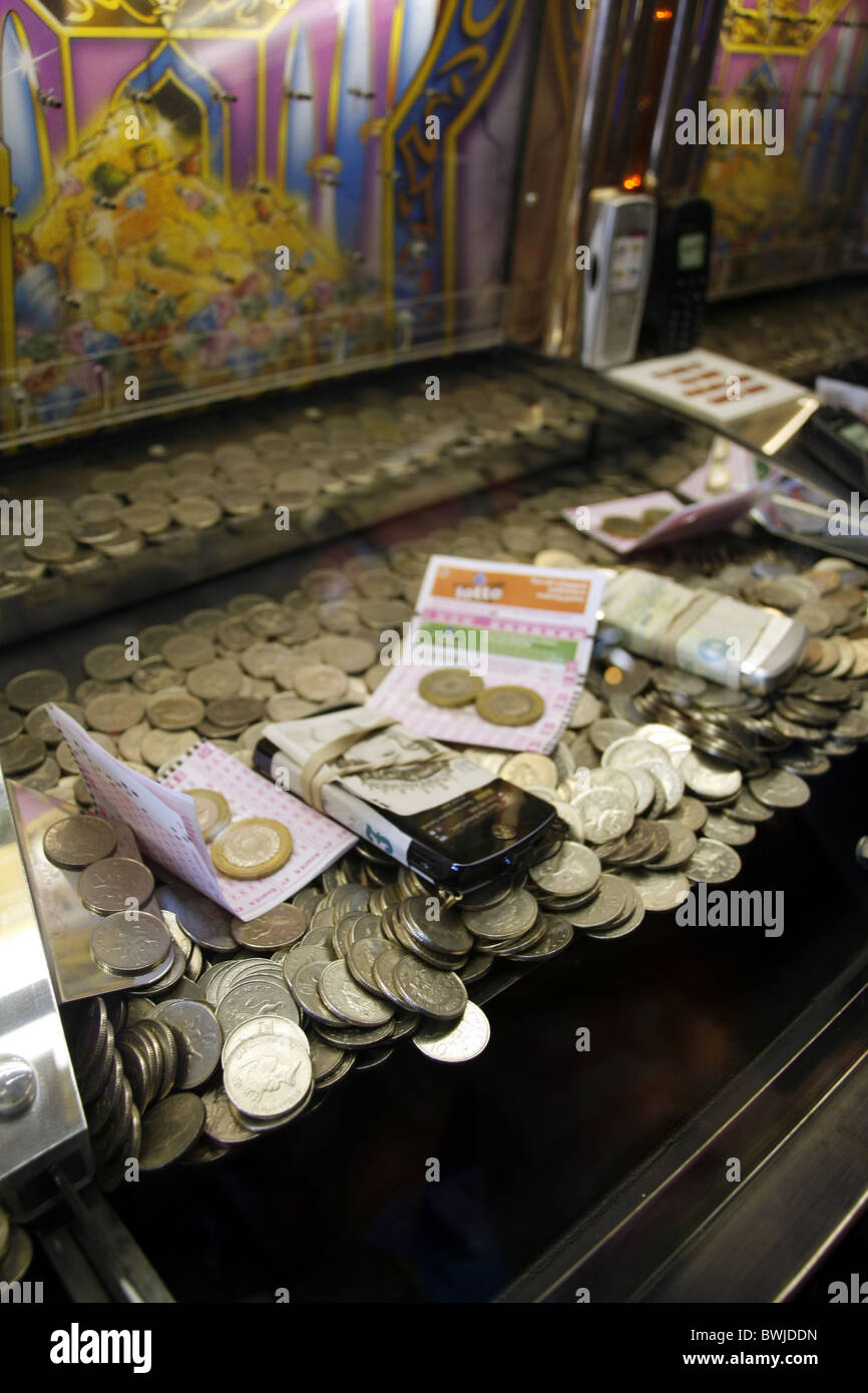 gambling machine game with coins and prizes in casino amusement arcade ...