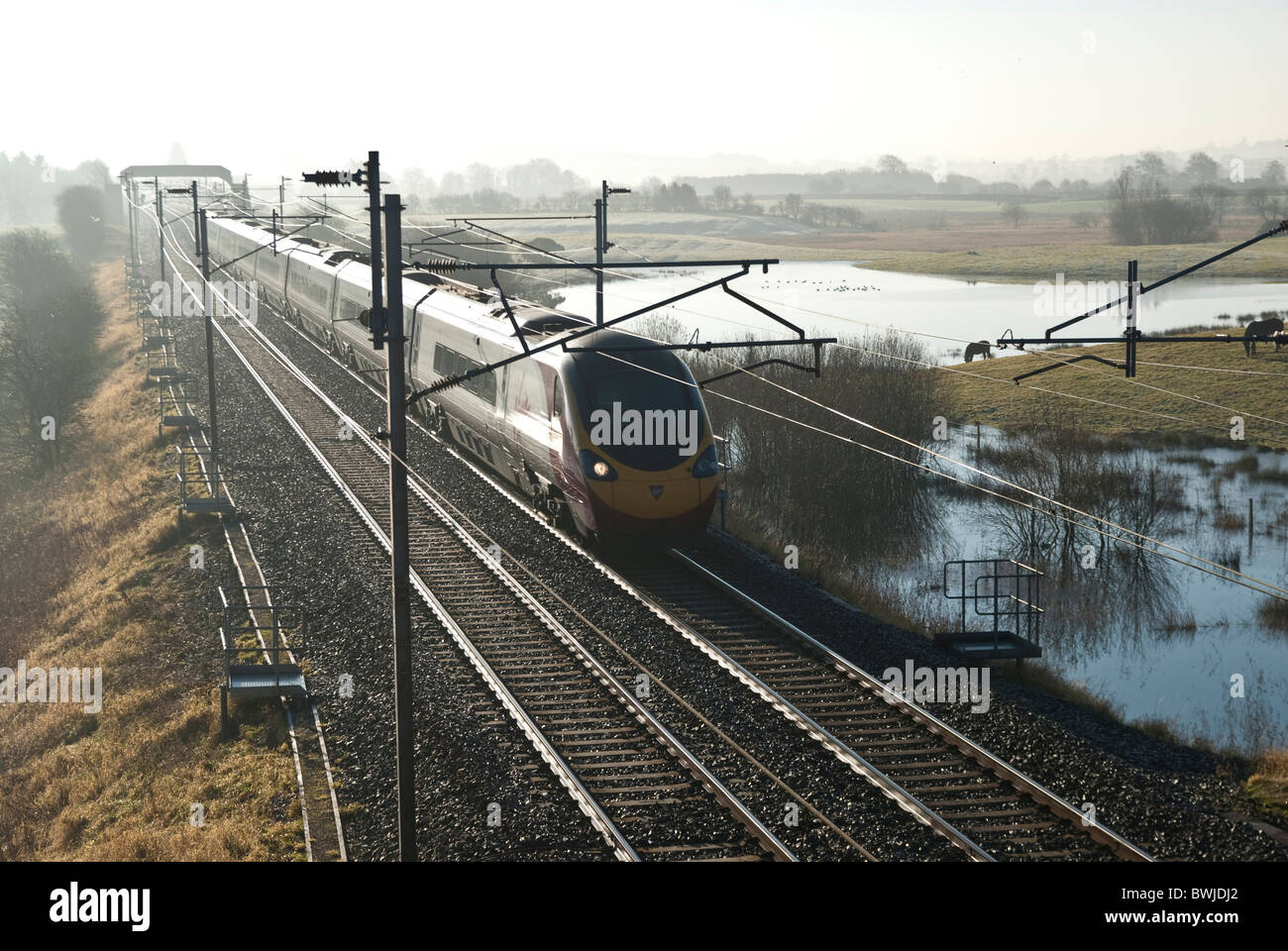 train on main line Stock Photo - Alamy