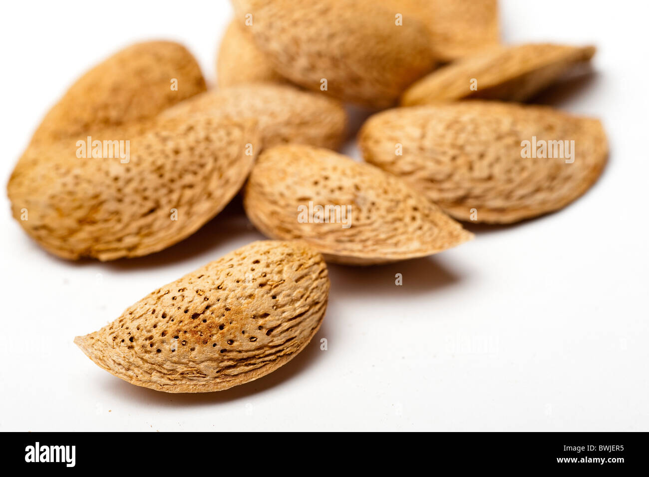 Almonds in shell on white hi-res stock photography and images - Alamy