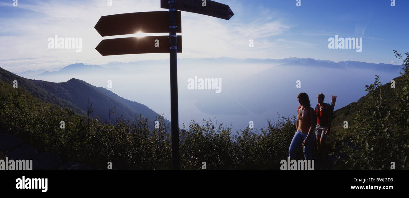 Two women woman view signpost footpaths mood panorama smoke mountains ...