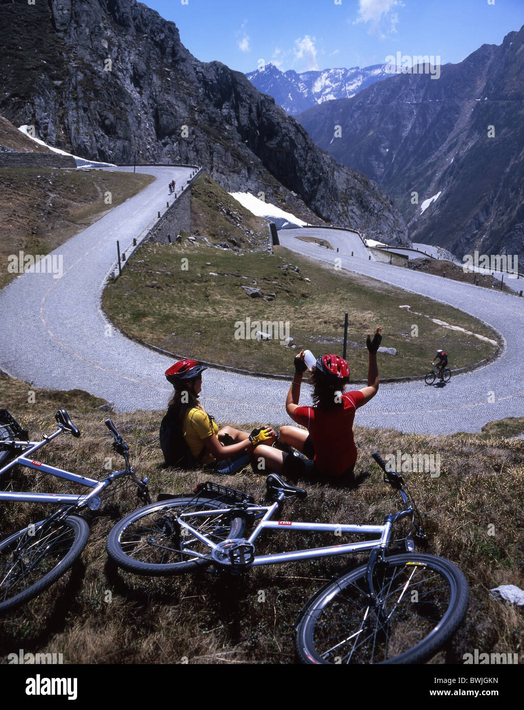 bikers rest break stop mountain bike serpentines curves alpine pass ...