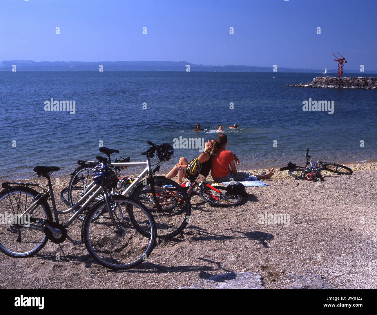bikings couple group bathing summer rest refreshment lake lake shore ...