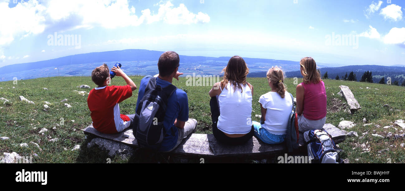 hiking hiker family from back sit sitting rest break stop bank bench ...