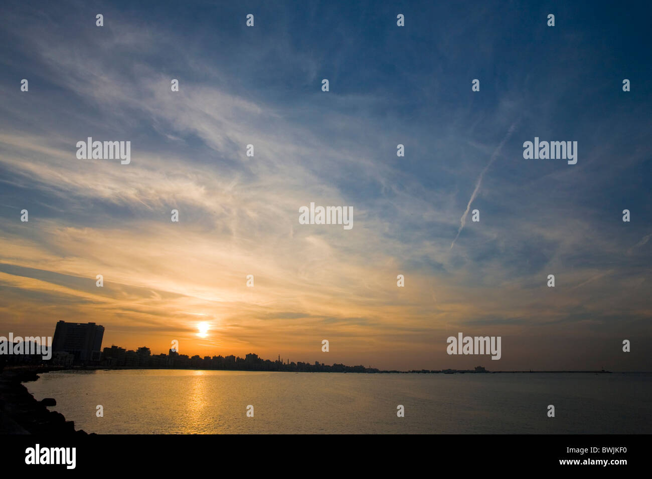 Fort Qaitbey and the Corniche, sunset, Alexandria, Egypt Stock Photo ...