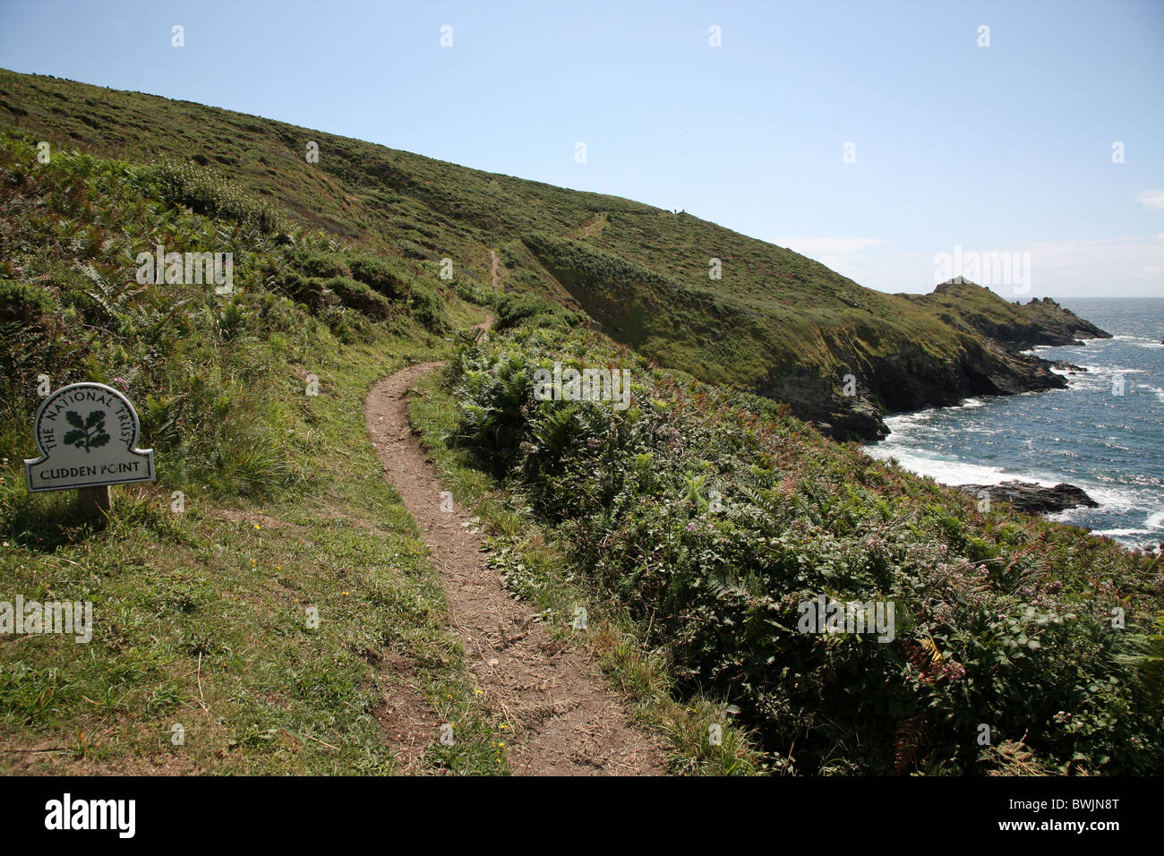The coastal path and National Trust sign at Cudden Point, Cornwall ...