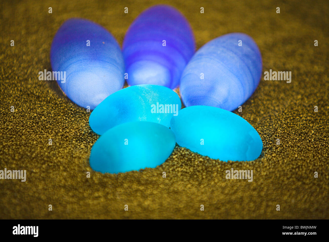 Lighted blue zen stones Stock Photo - Alamy