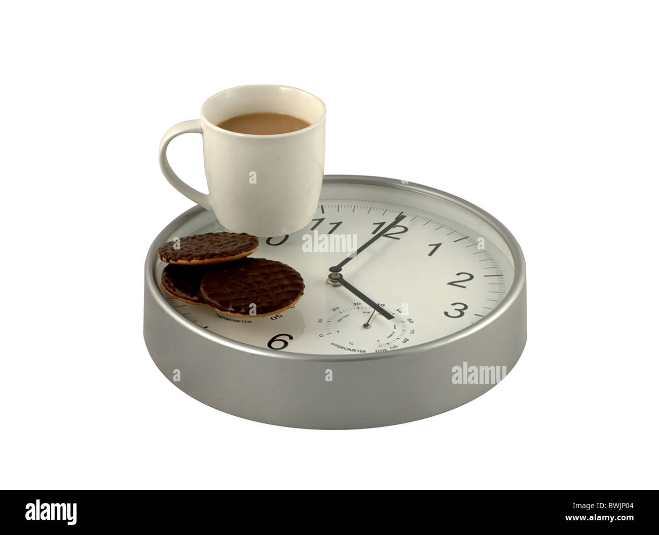Afternoon mug of tea, clock and chocolate digestive biscuits Stock ...