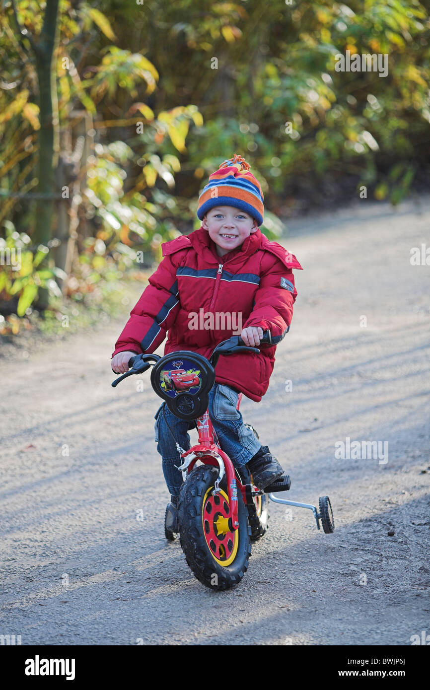 Little Boy Learning To Ride A Bike Stock Photo Alamy little-boy-learning-to-ride-a-bike-stock-photo-alamy