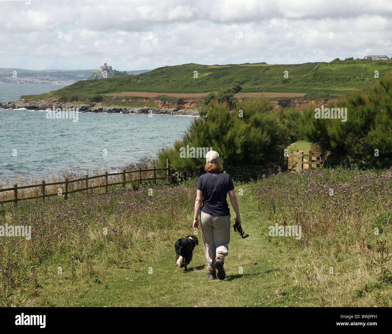 The coastal path near to the town of Perranuthnoe, with St. Michael's ...