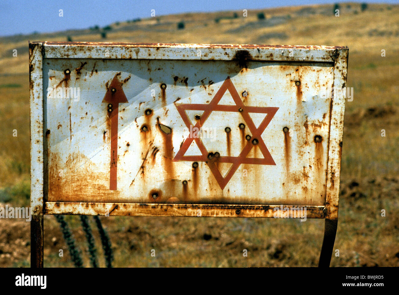 Israel. Star of David road sign with bullet holes on the road to the ...