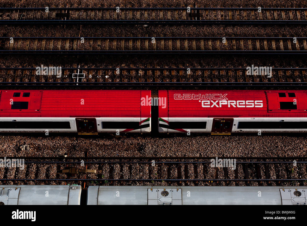 Gatwick express traveling along the tracks by Battersea Power Station ...