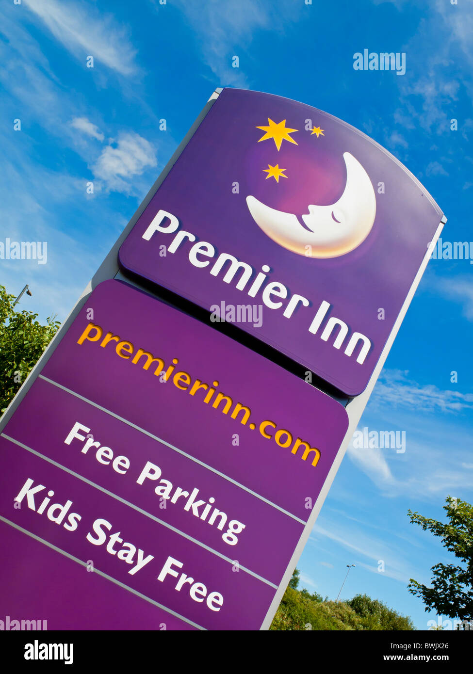 Premier Inn sign outside a budget hotel part of a chain in the UK owned ...