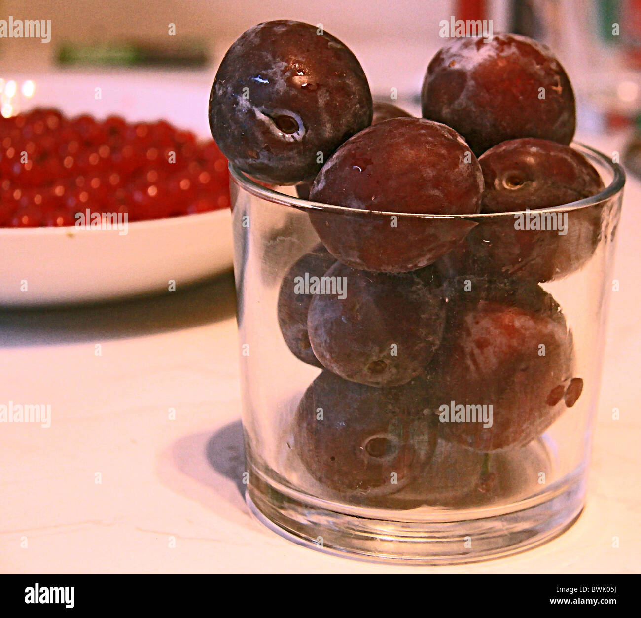 Food, plums in a glass Stock Photo - Alamy