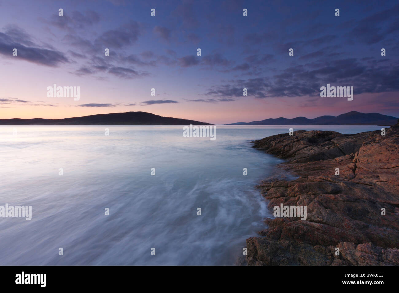 The isle of Taransay and North Harris hills seen across the sound of ...