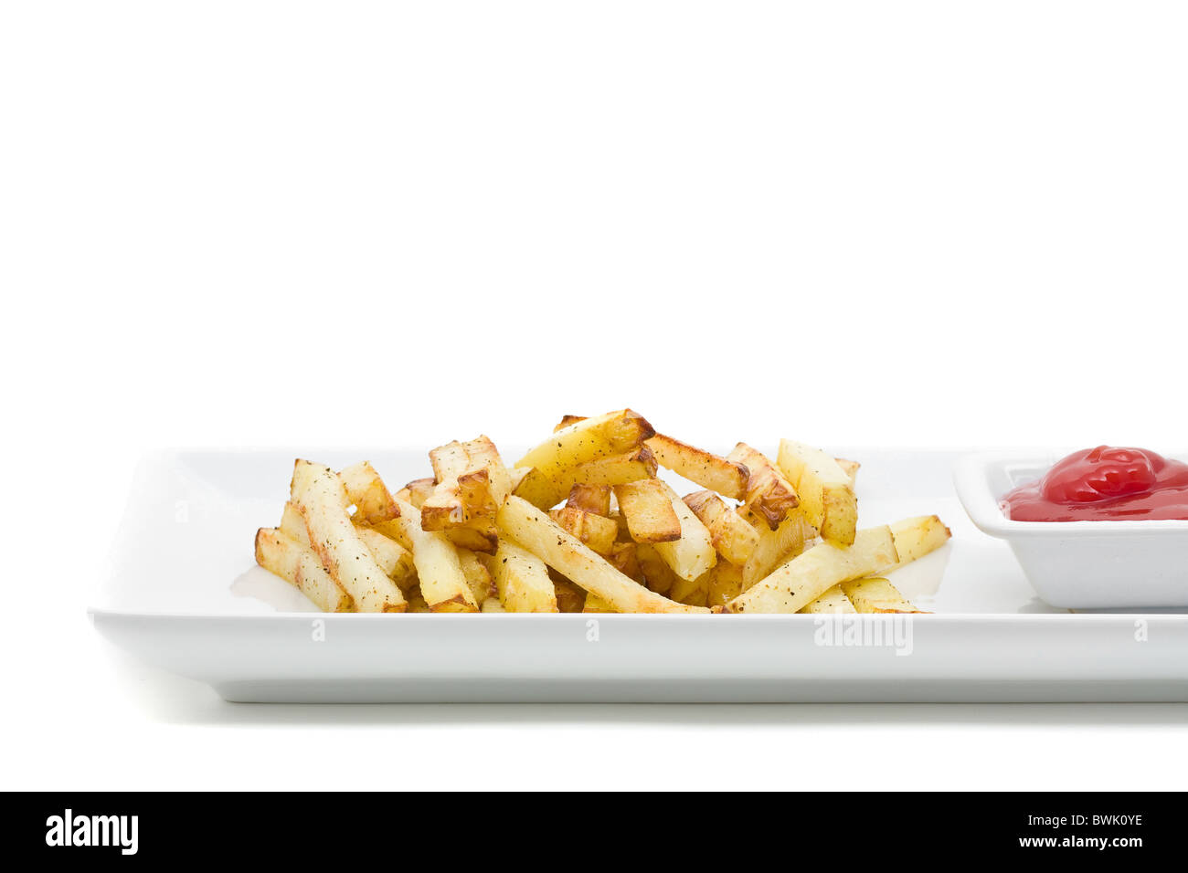 French fries on plate Cut Out Stock Images & Pictures - Alamy