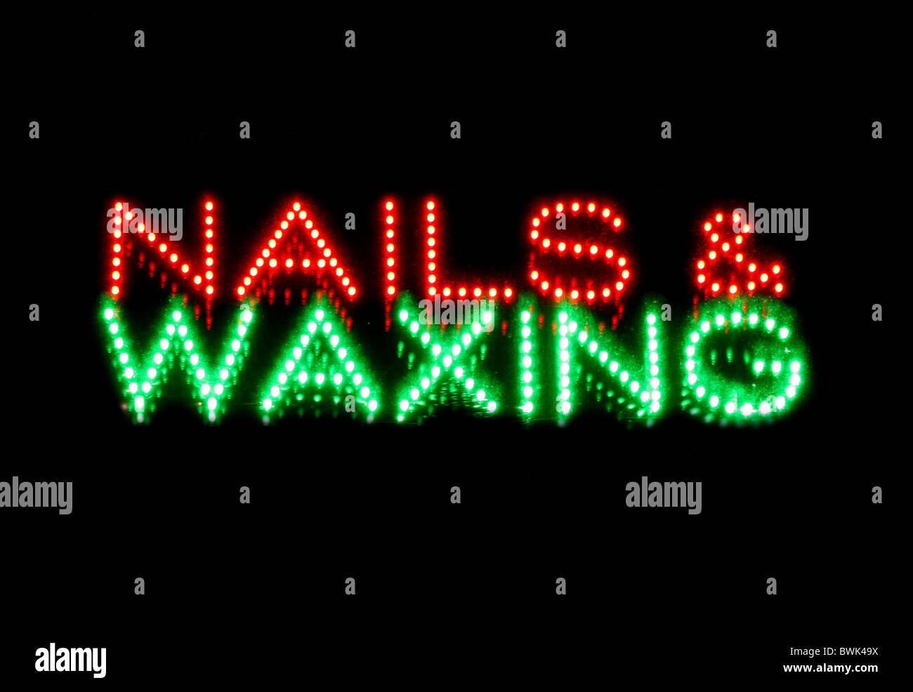 Nails and waxing beauty therapy sign isolated on black background Stock ...