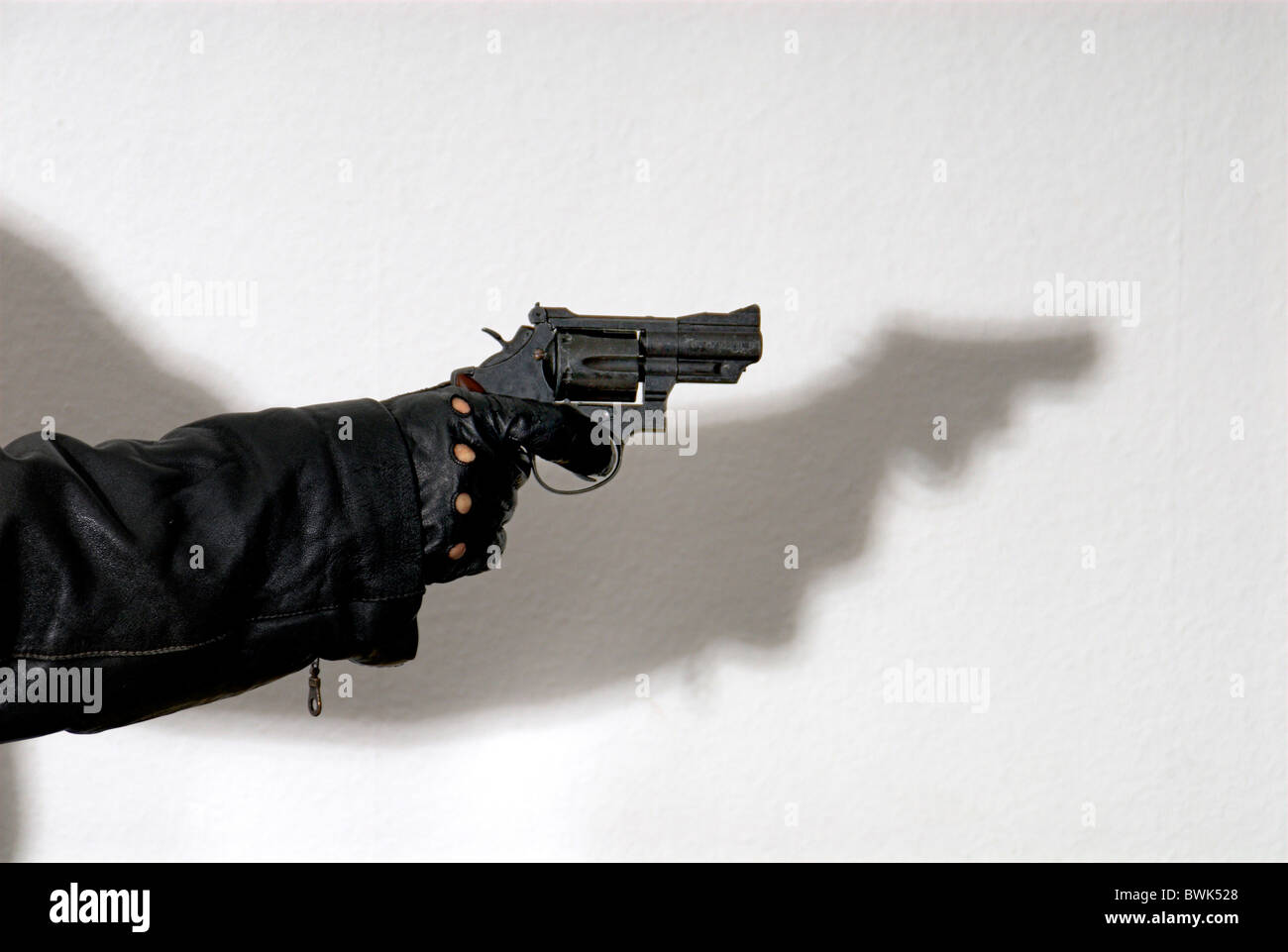 revolver gun gangster burglar shade danger threat raid criminal hand ...