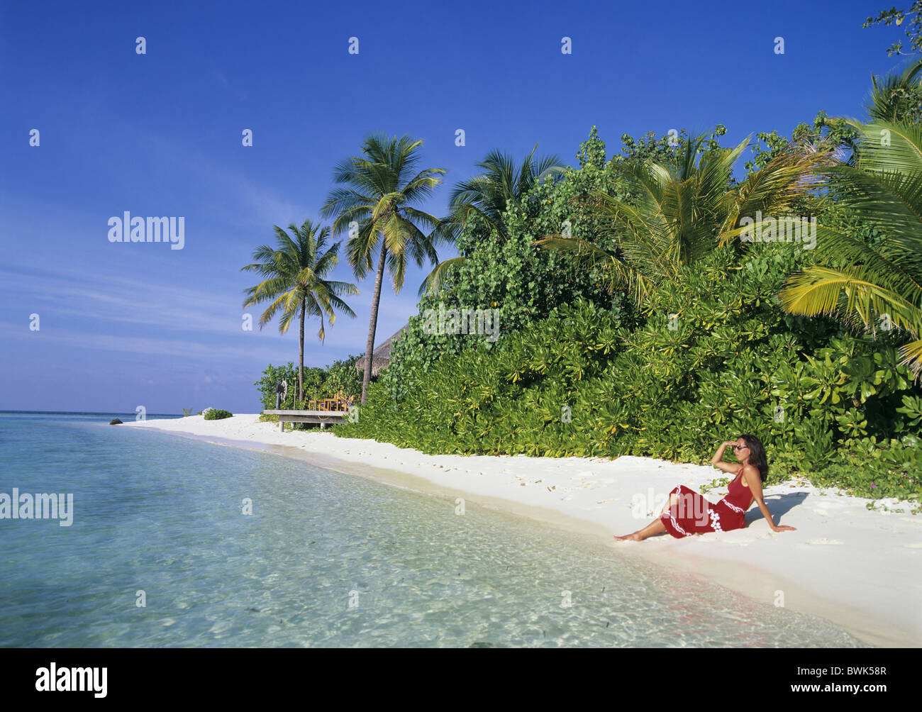 Maldives Asia Indian ocean island isle Kuda Huraa woman relax relaxed ...