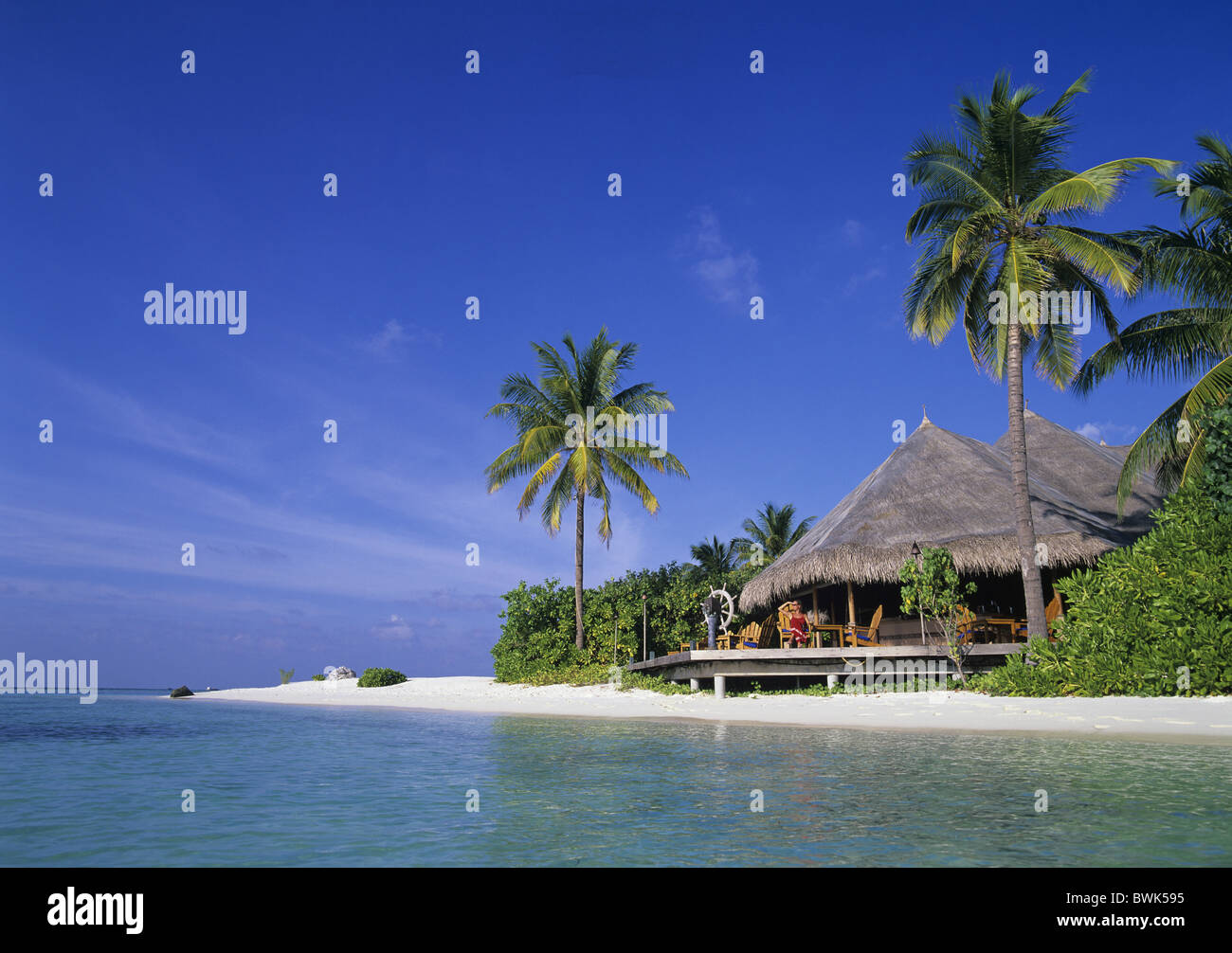 Maldives Asia Indian ocean island isle Kuda Huraa beach restaurant palm ...