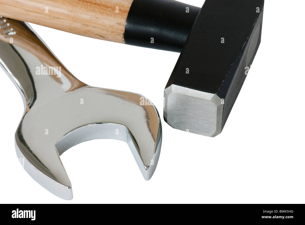 Hammer and wrench isolated on white Stock Photo - Alamy