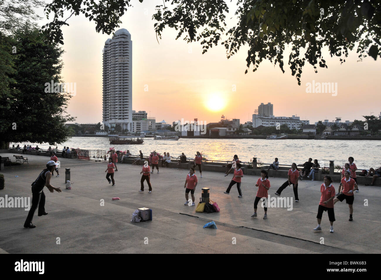 People at the river of Menam Chao at sunrise, Bangkok, Thailand ...
