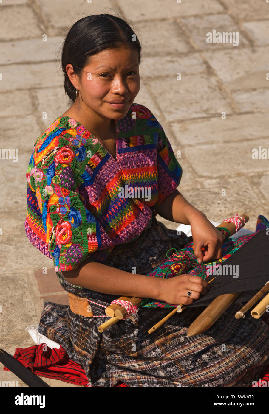 Cakchiquel people Kaqchikel Maya woman girl weaving manual labor ...