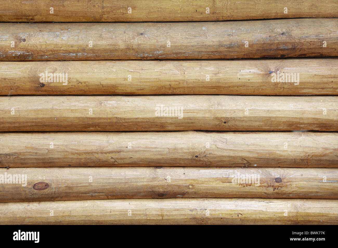 Wall of a building made of wooden logs Stock Photo - Alamy