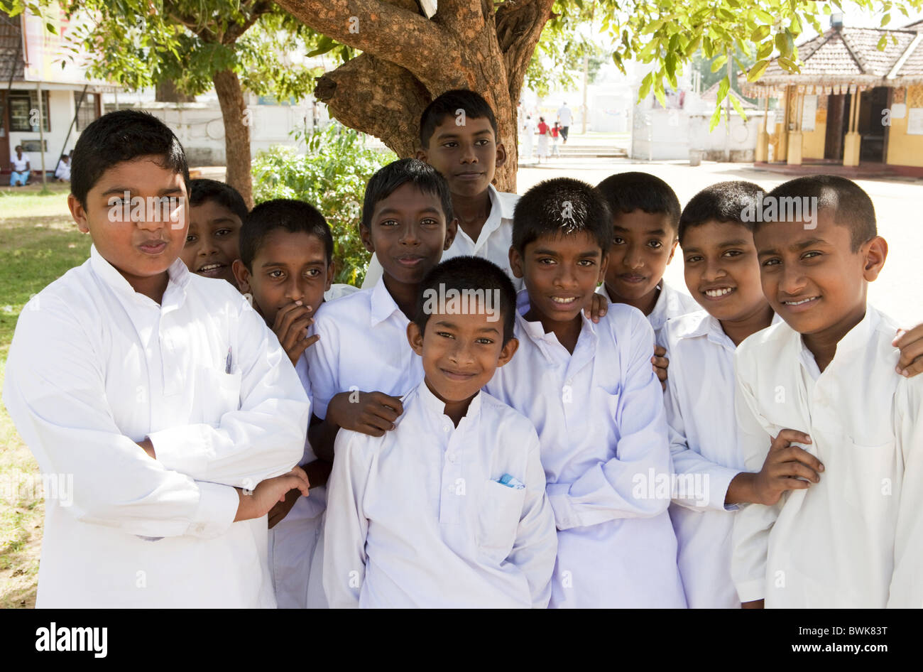 Sinhalese boys in their school uniforms in front of the Santagiri ...