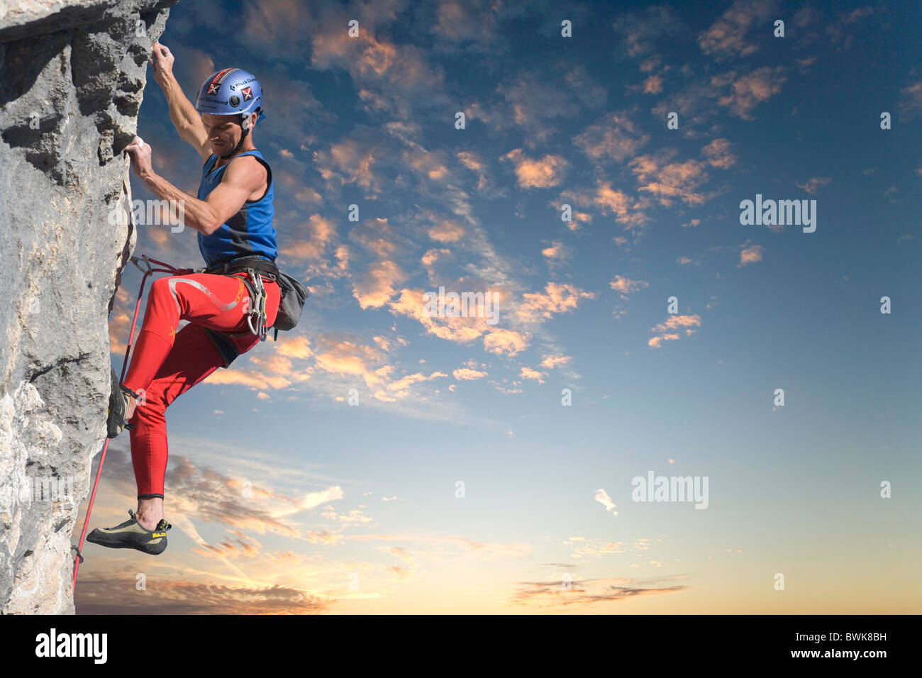 man cliff wall cloud sky assembly rock climbing free climbing sports ...