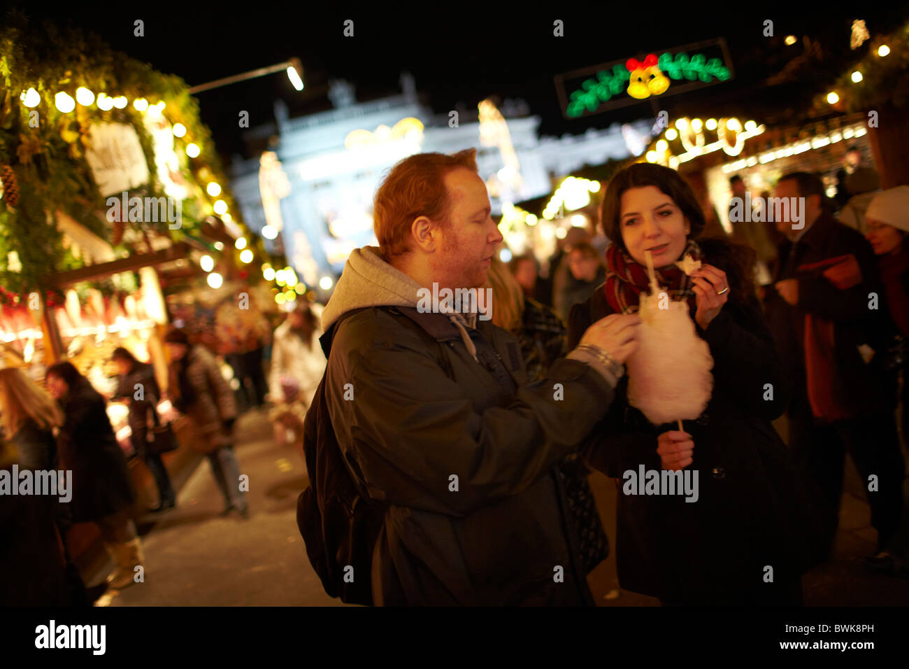couple eating candy floss Christmas market Vienna Stock Photo - Alamy