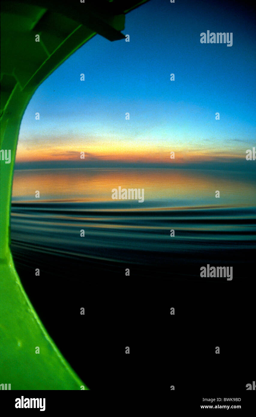 sea dusk twilight mood ship windless Stock Photo - Alamy