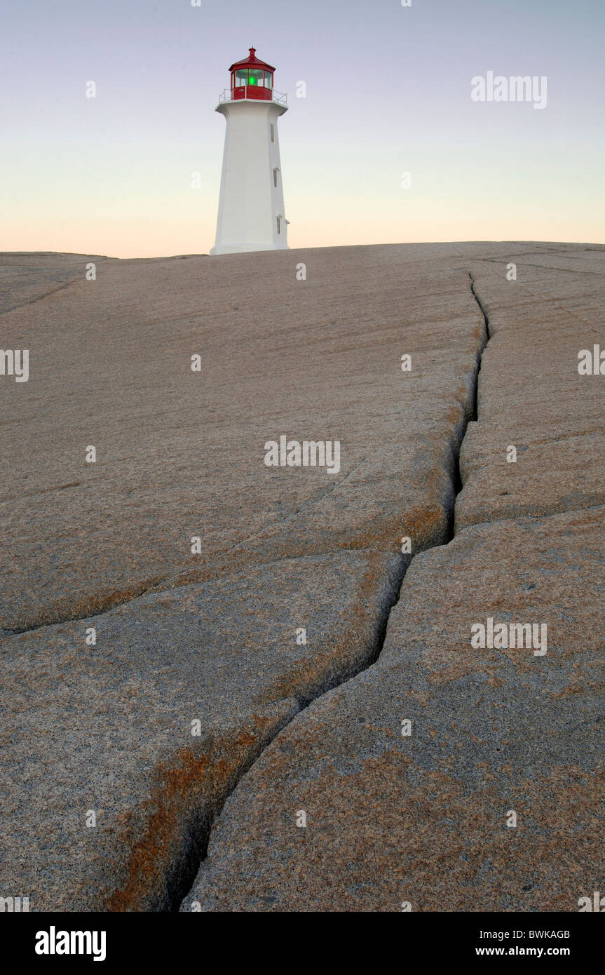 lighthouse coast sea scenery landscape rock cliff Peggys Cove mood dusk ...