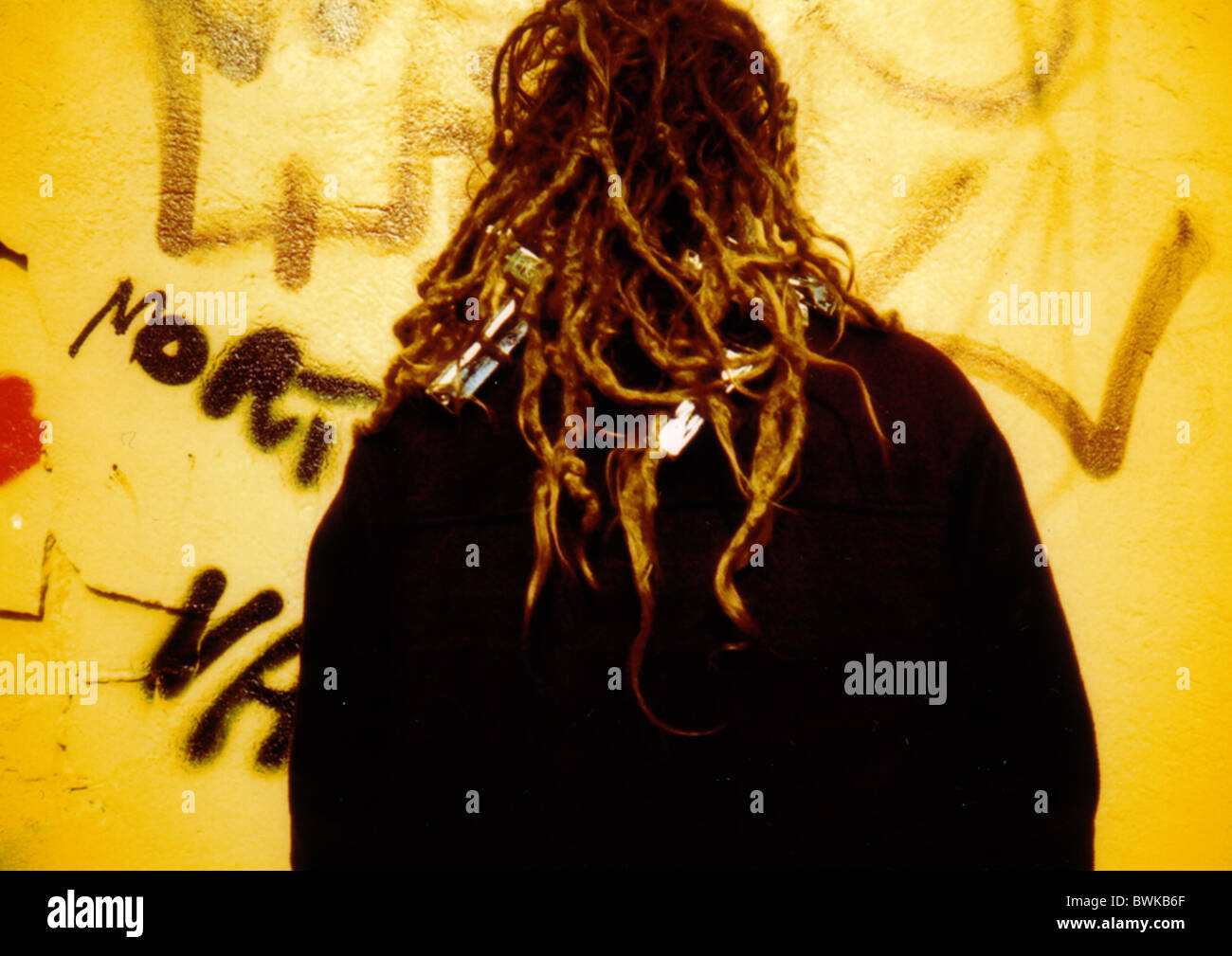 dreadlocks hair from back back view man lifestyle graffiti wall Urbane ...