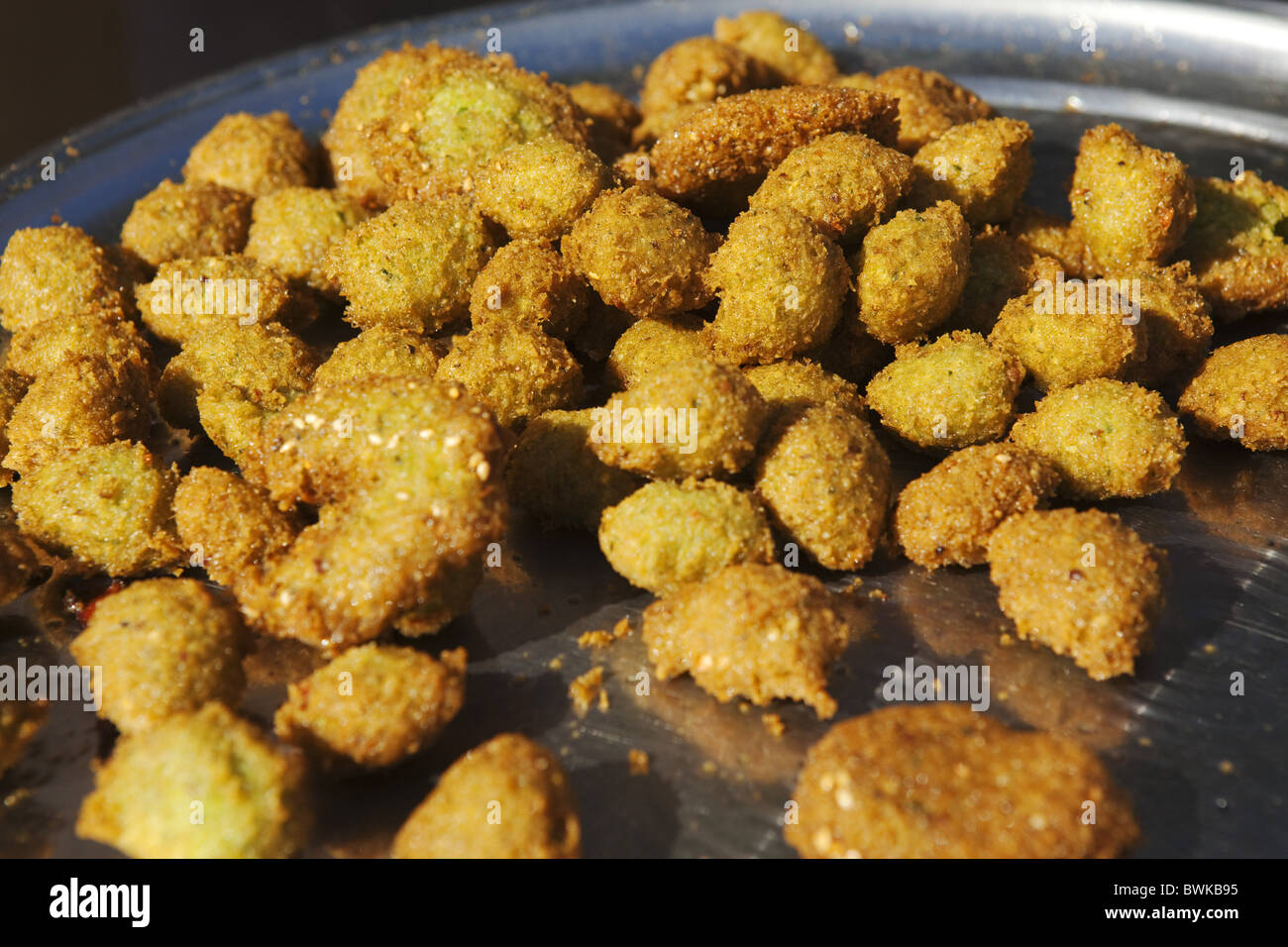 Fried zucchini balls displayed at a food stand in the zouk, Abu Simbel ...