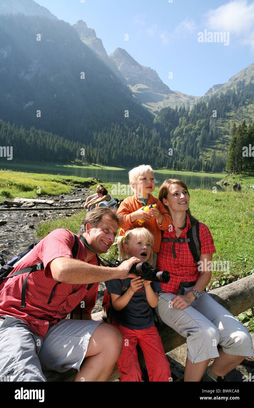 children parents family family excursion binoculars field glasses ...