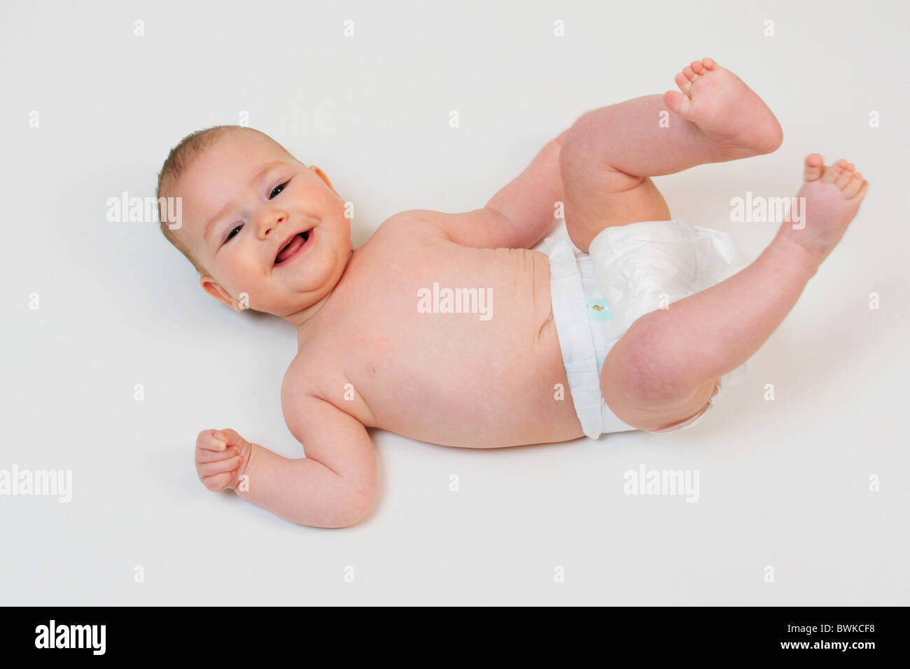 baby infant child diapers nappies recumbent lie lying studio Inside ...