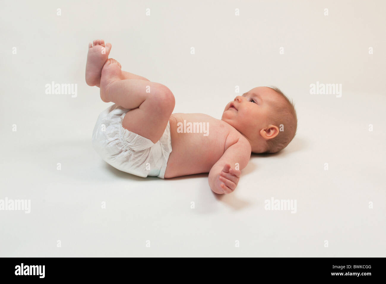 baby infant child diapers nappies recumbent lie lying studio Inside ...