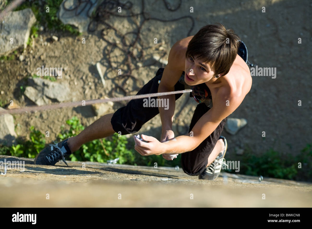 Image of man hanging on the rope Stock Photo - Alamy