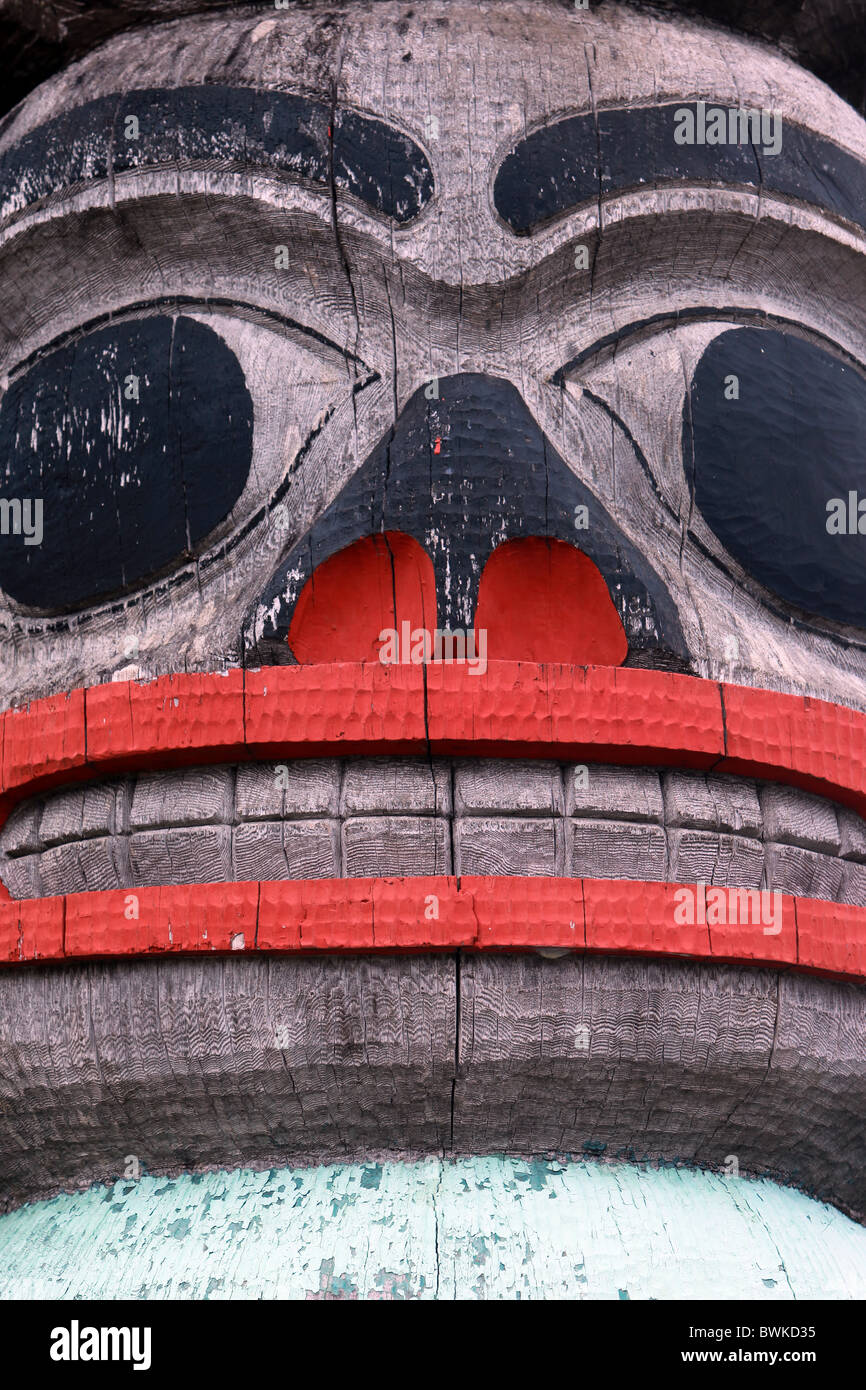 Traditional Alaskan Totem pole close up of face Stock Photo - Alamy