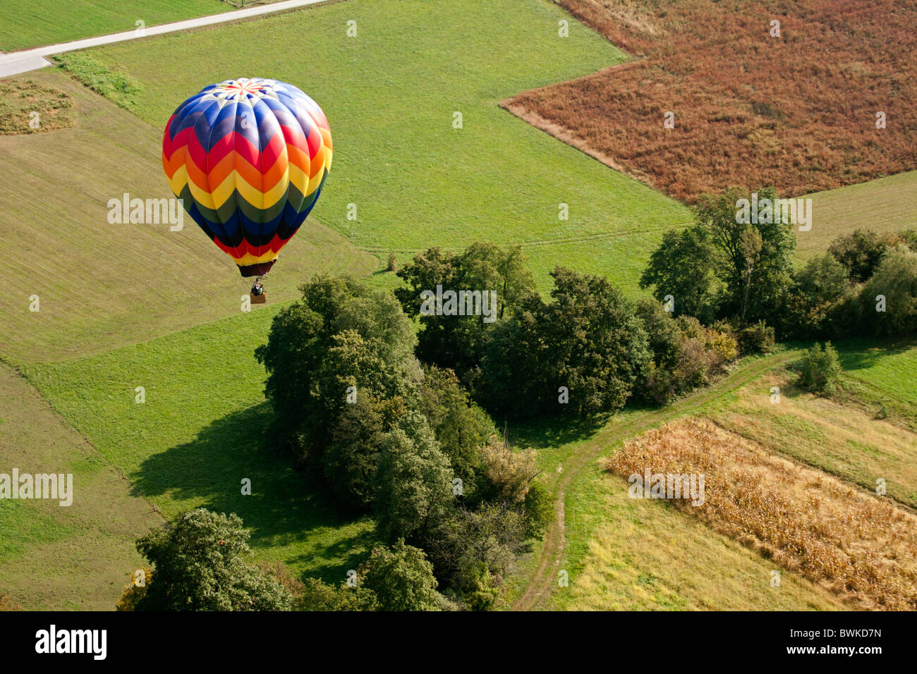 View on the colorful hot air balloon from above Stock Photo - Alamy