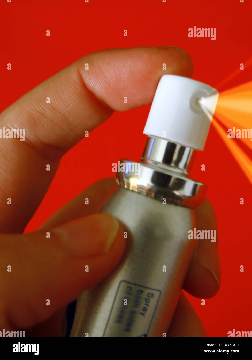 spraying spray spray can finger hand ray Stock Photo - Alamy