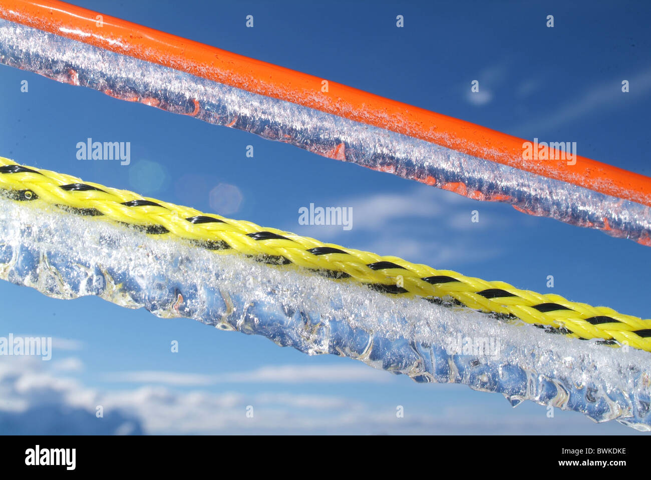 rope stick lines ice Frozen cold winter sky infrastructure construction ...