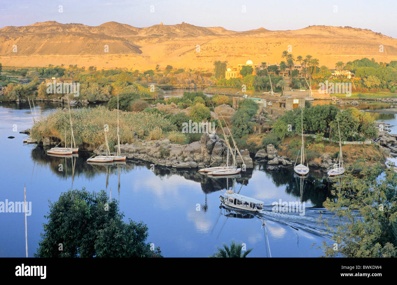 Egypt North Africa Aswan island isle Nile river flow sail boats boats ...