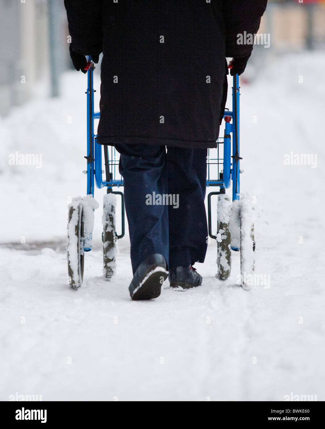 Man with a walker at wintertime.Eskilstuna.Sweden Stock Photo - Alamy