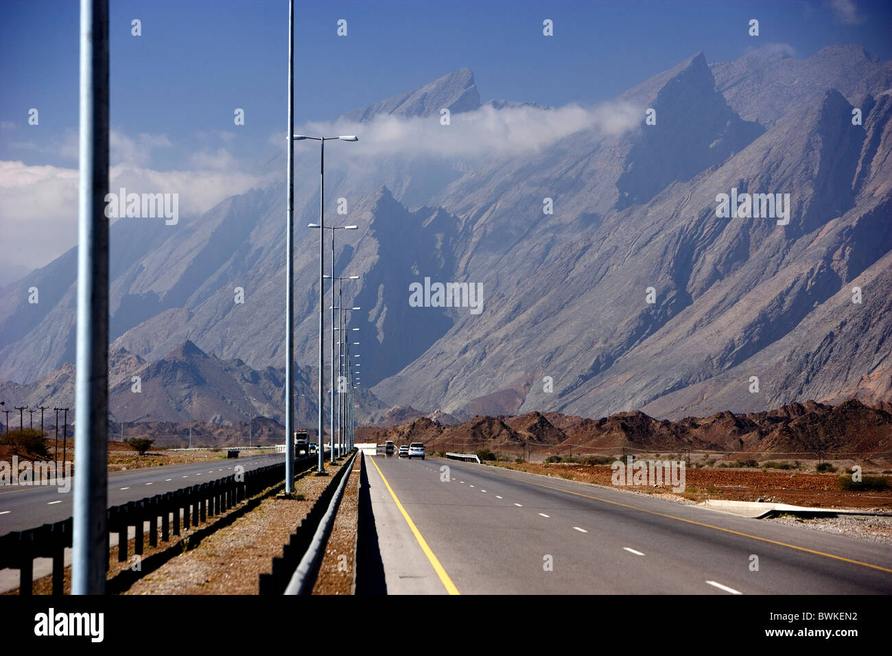 Oman Arabia East Hajjar Al-Hajar Hadschar mountains street highway ...