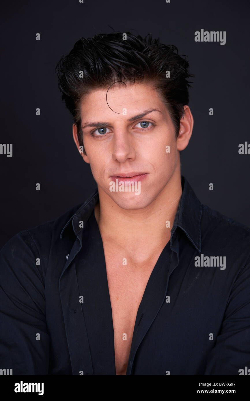 Black coloured colored young man hi-res stock photography and images ...