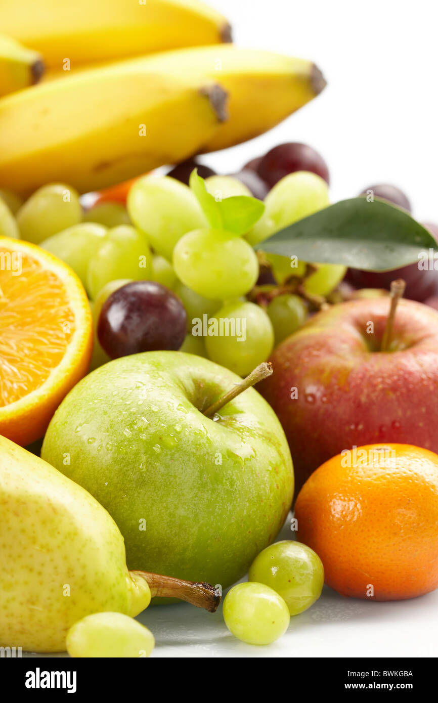 fresh fruits on the white background Stock Photo - Alamy