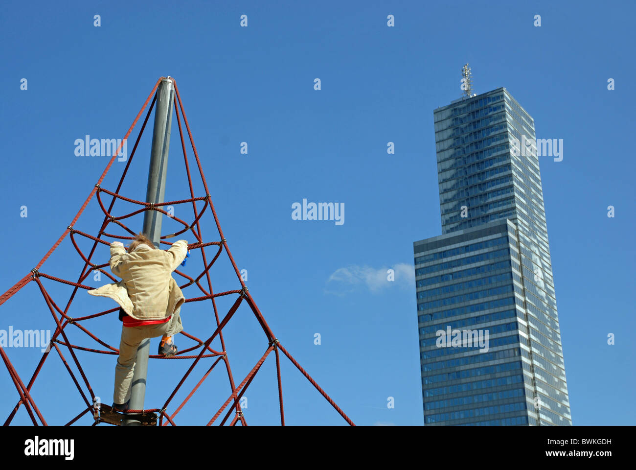 boy child boy climbing climbing scaffolding playground Cologne tower ...